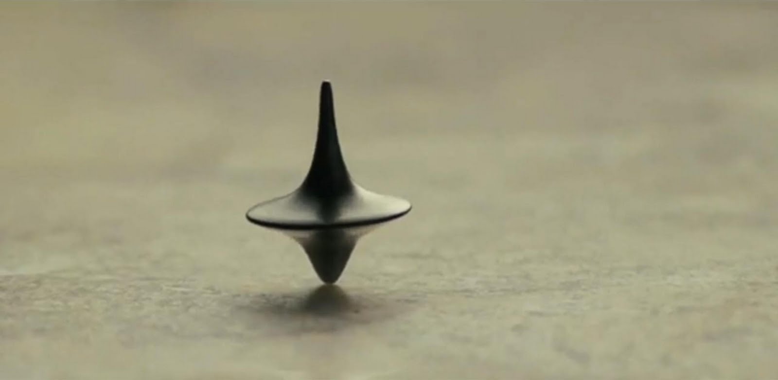 Christopher Nolan finally explains the Inception ending - The Muslim Vibe