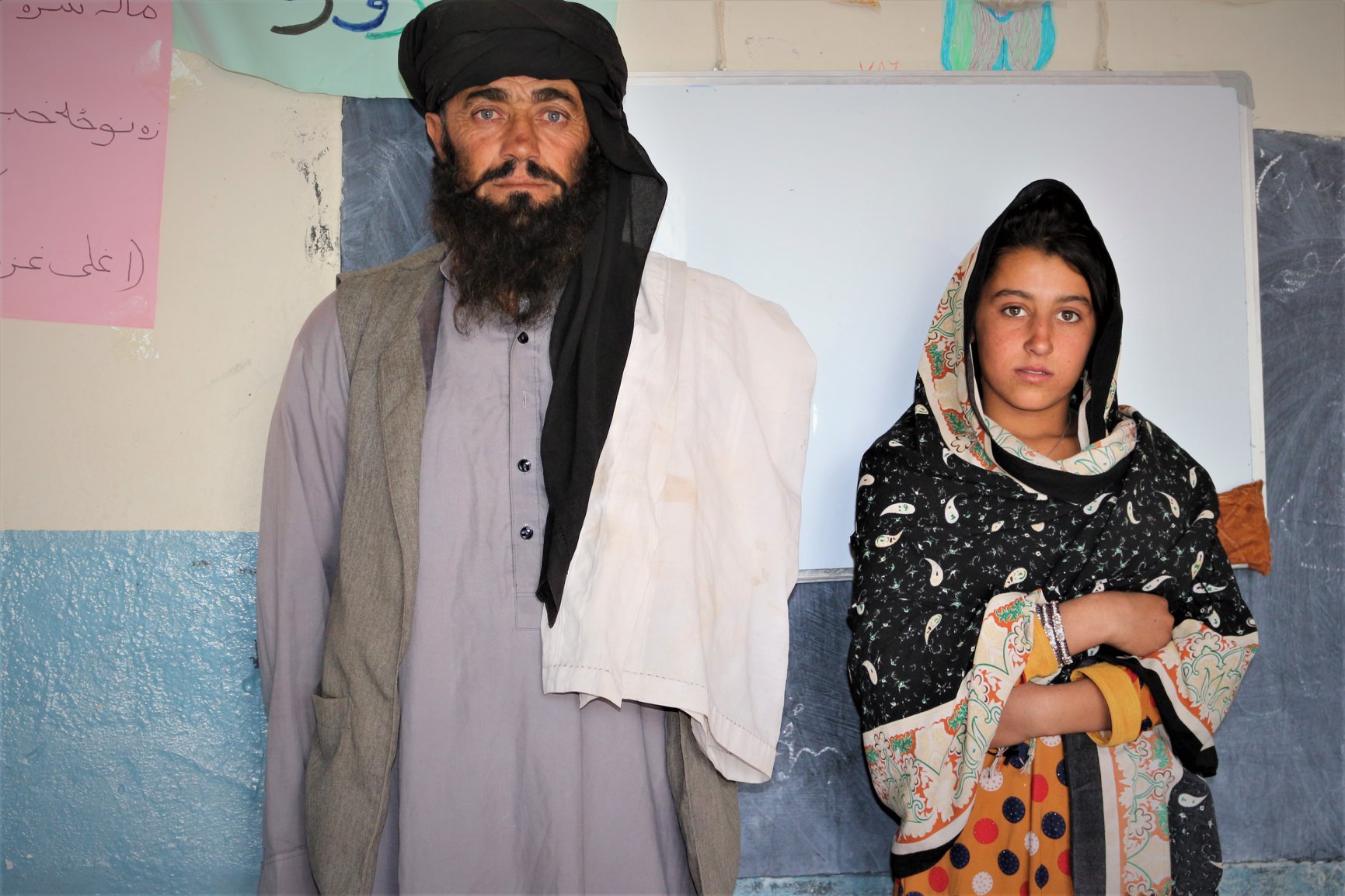 Afghan father travels 12 km daily to make sure daughters can safely ...